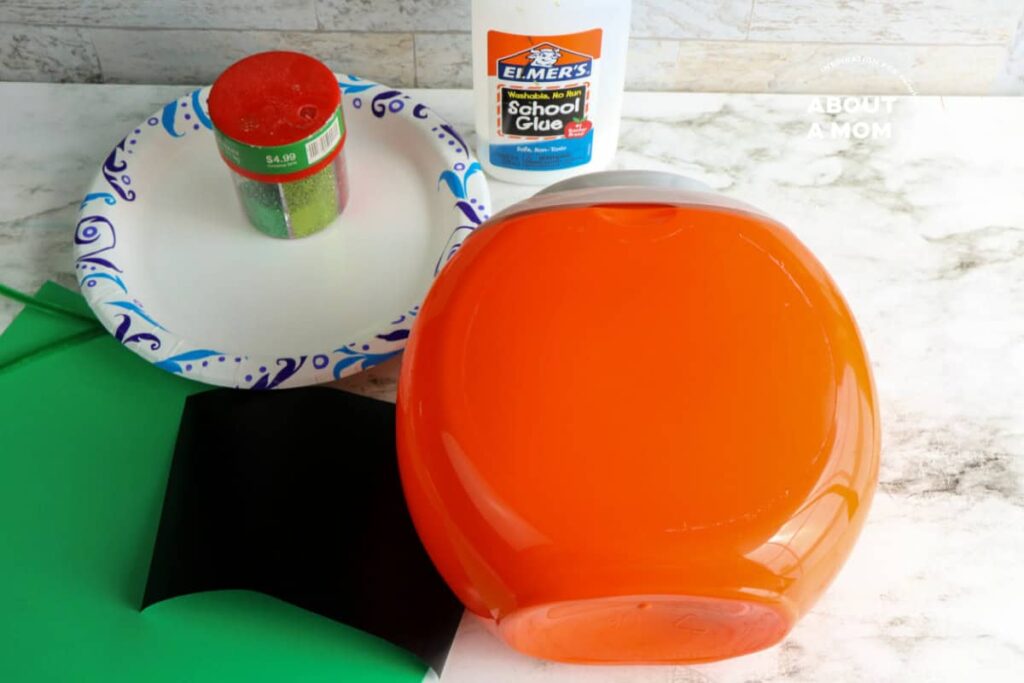 Recycled Tide Pod Container Pumpkin Craft for Kids - About a Mom