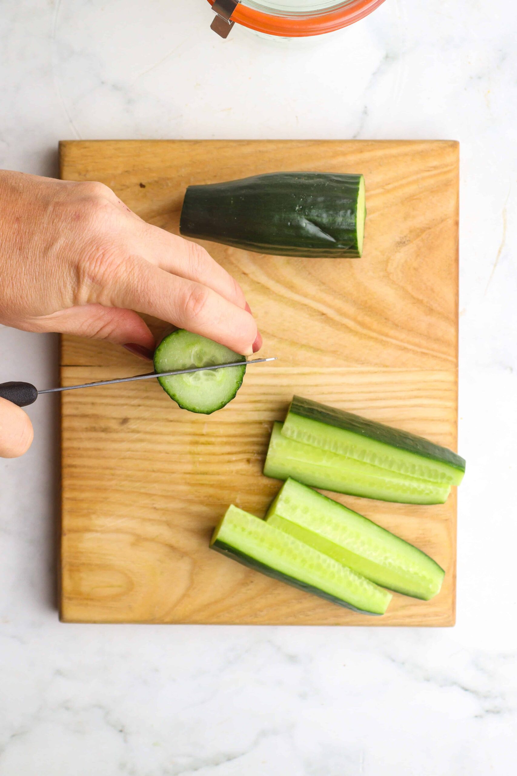 Quick and Easy Pickled Cucumbers - About a Mom